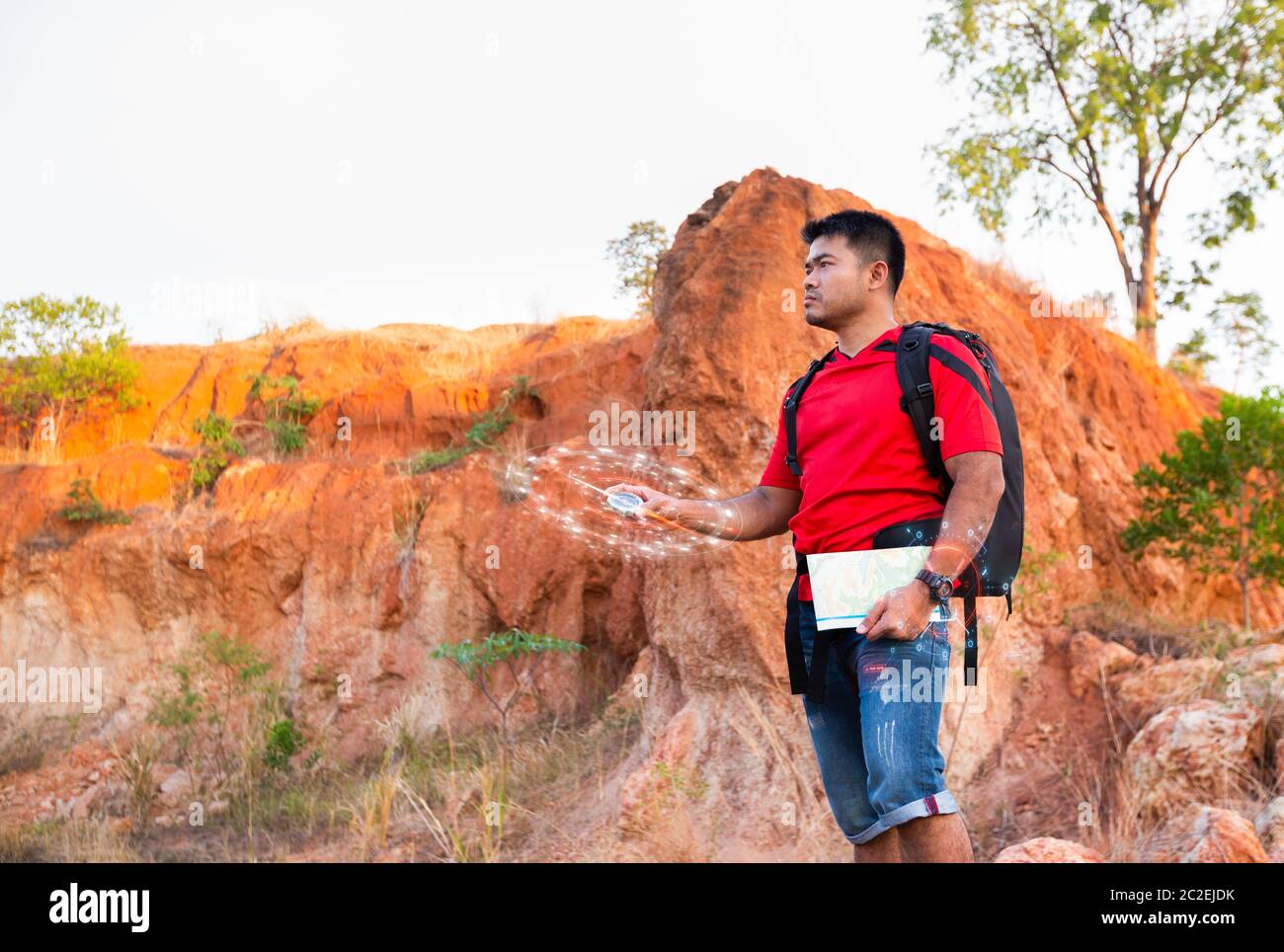 Adventure man observing map hi-res stock photography and images - Alamy