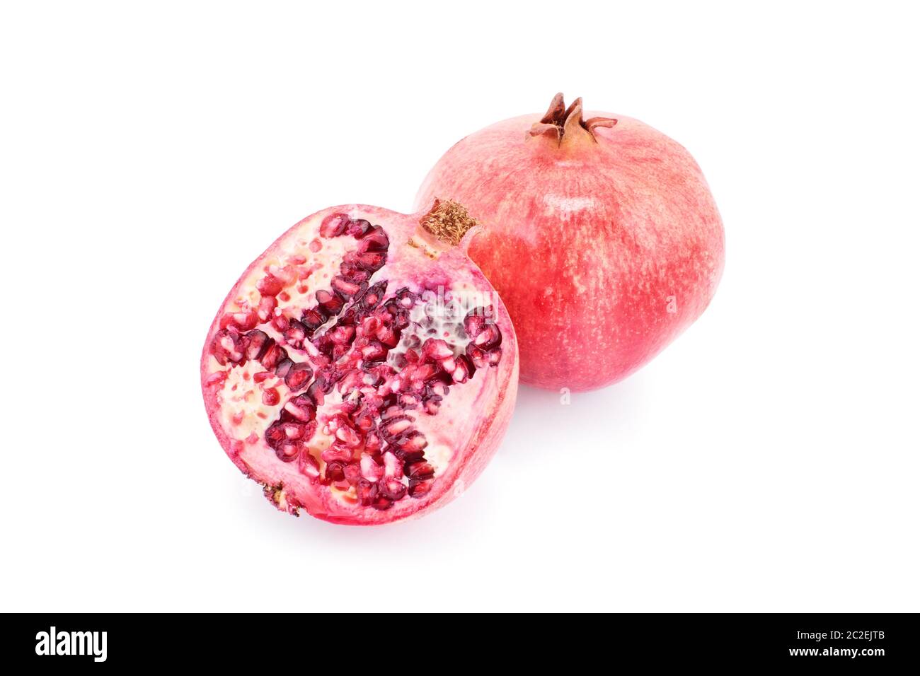 Ripe pomegranates isolated on white background Stock Photo - Alamy