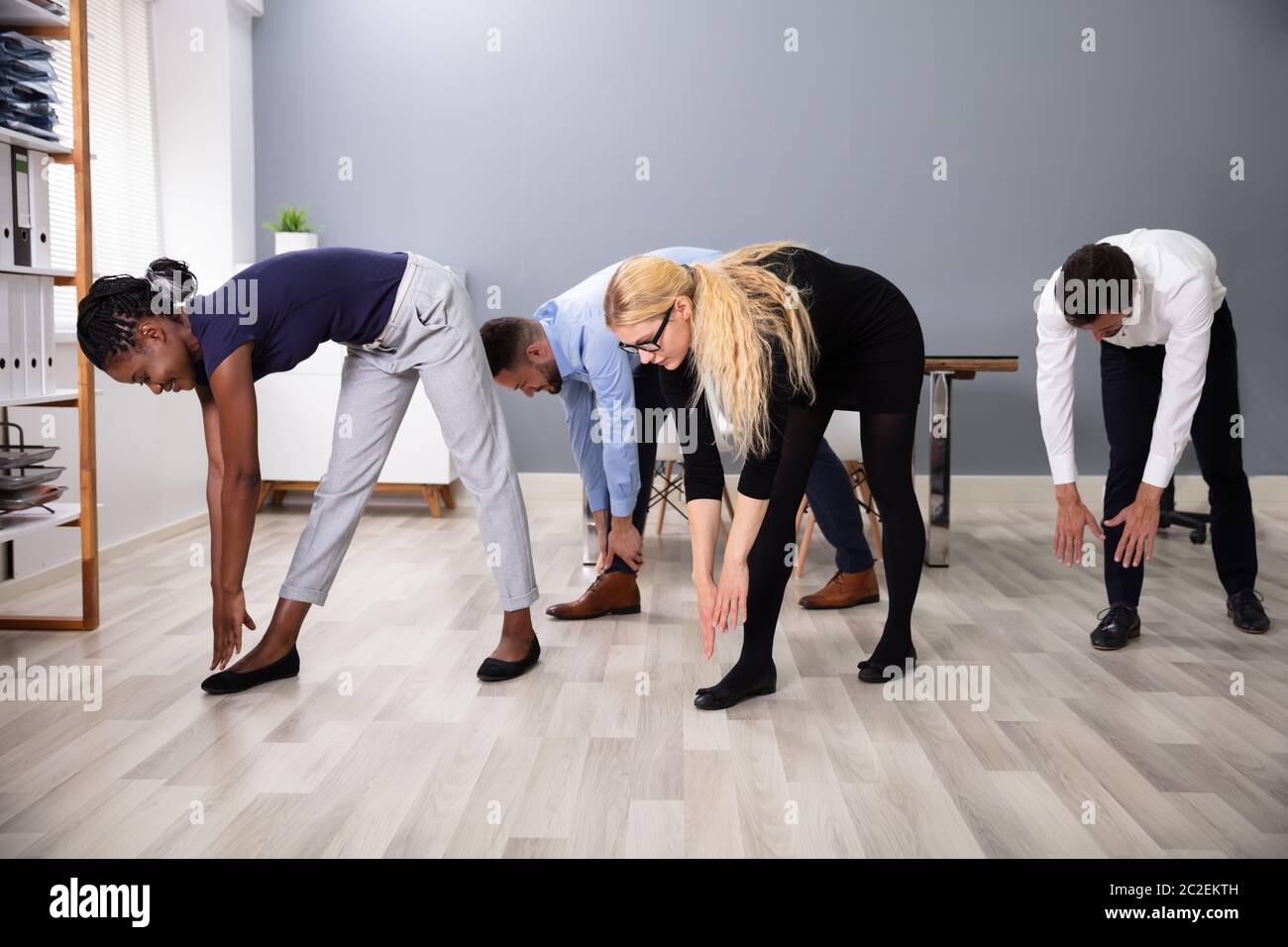 Multiethnic group people stretching hi-res stock photography and images ...