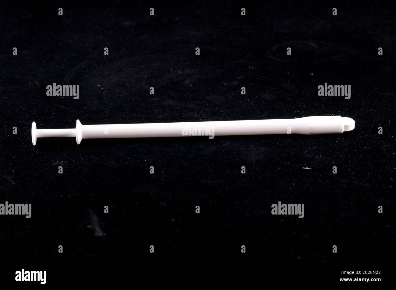 Photo Picture of a White Strange Pill Syringe Stock Photo - Alamy