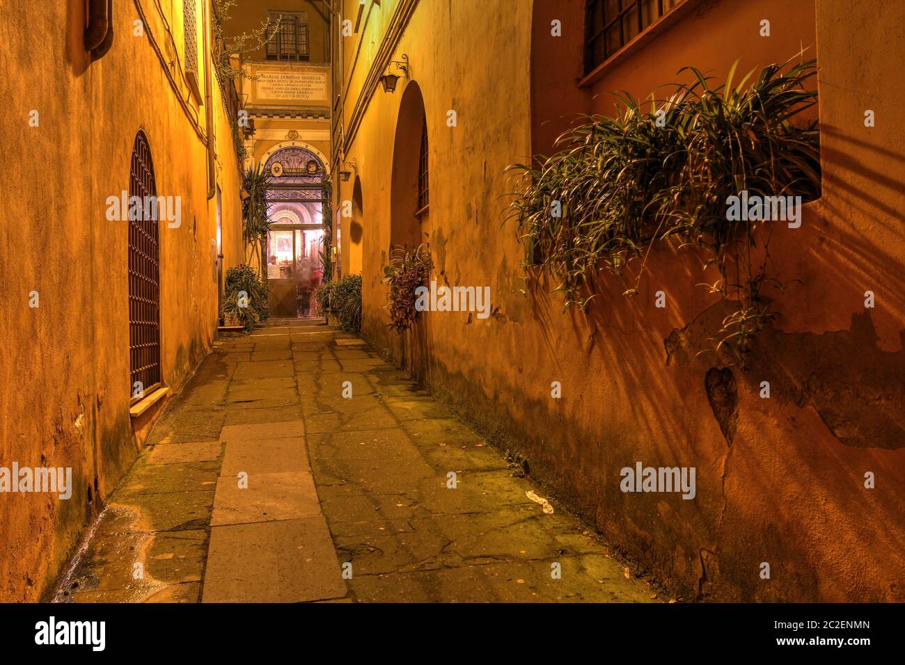 Narrow passage leading for one of the smallest church in Rome, Italy ...