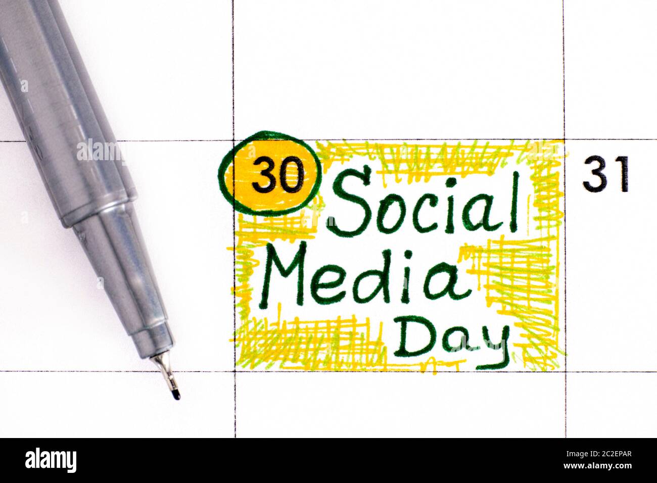 Reminder Social Media Day in calendar with pen. June 30 Stock Photo - Alamy