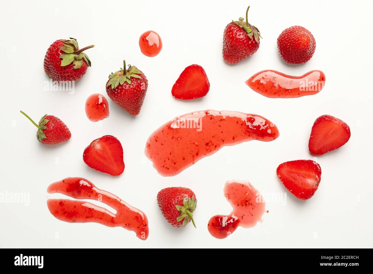 Composition with strawberry and jam on white background Stock Photo - Alamy