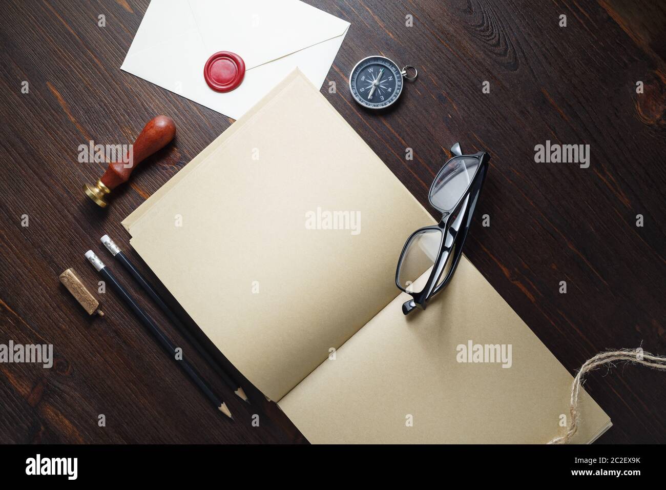 Kraft paper book and retro stationery on wood table background ...