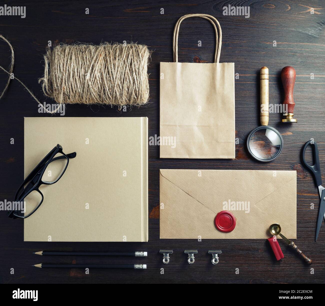 Blank kraft paper stationery set on wood table background. Branding ...