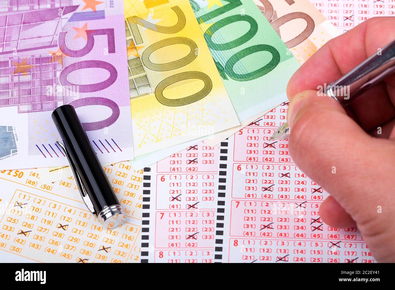 Lottery ticket with European money Stock Photo - Alamy