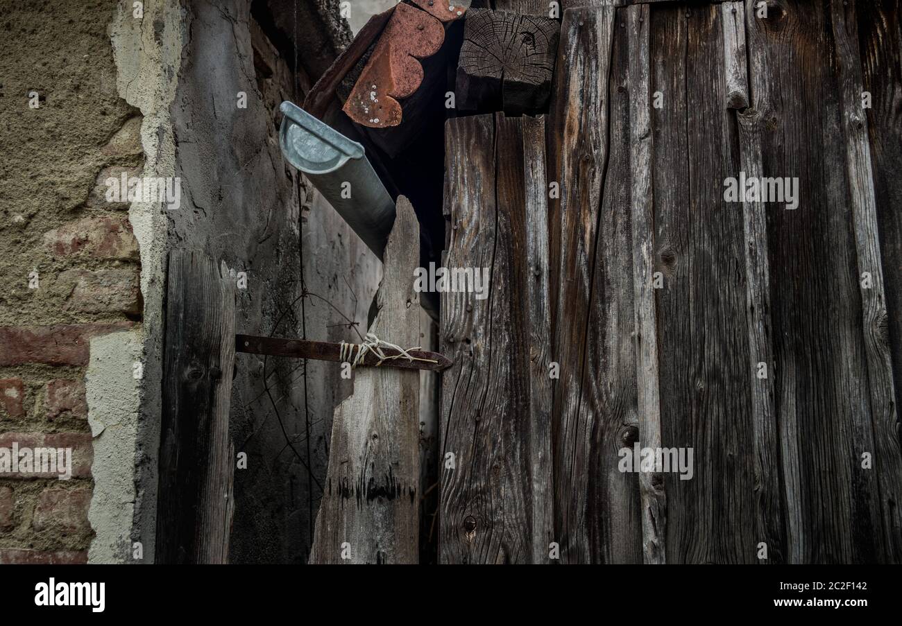 a gutter is temporarily supported. help and provisional symbol Stock ...