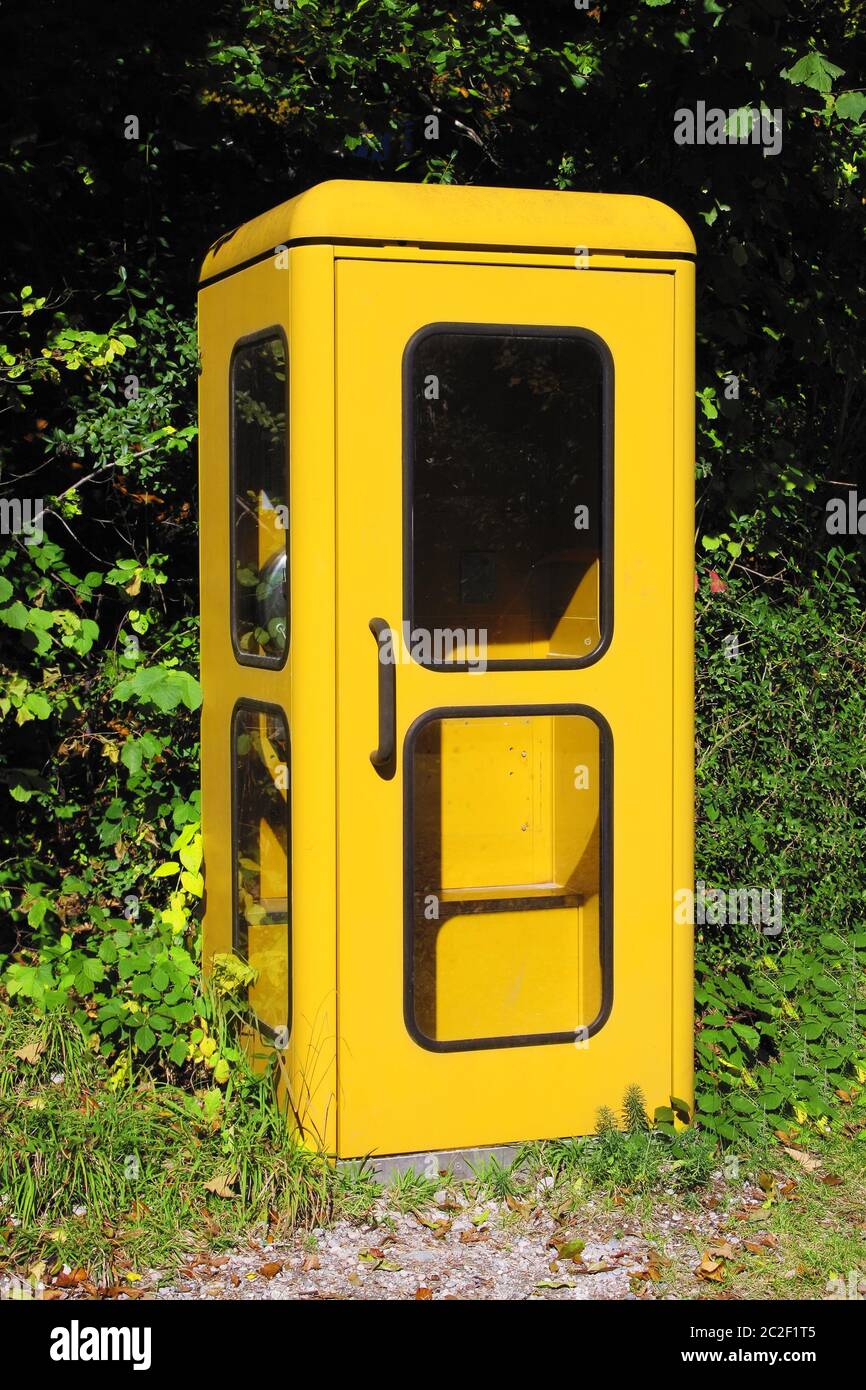 Yellow telephone box hi-res stock photography and images - Alamy