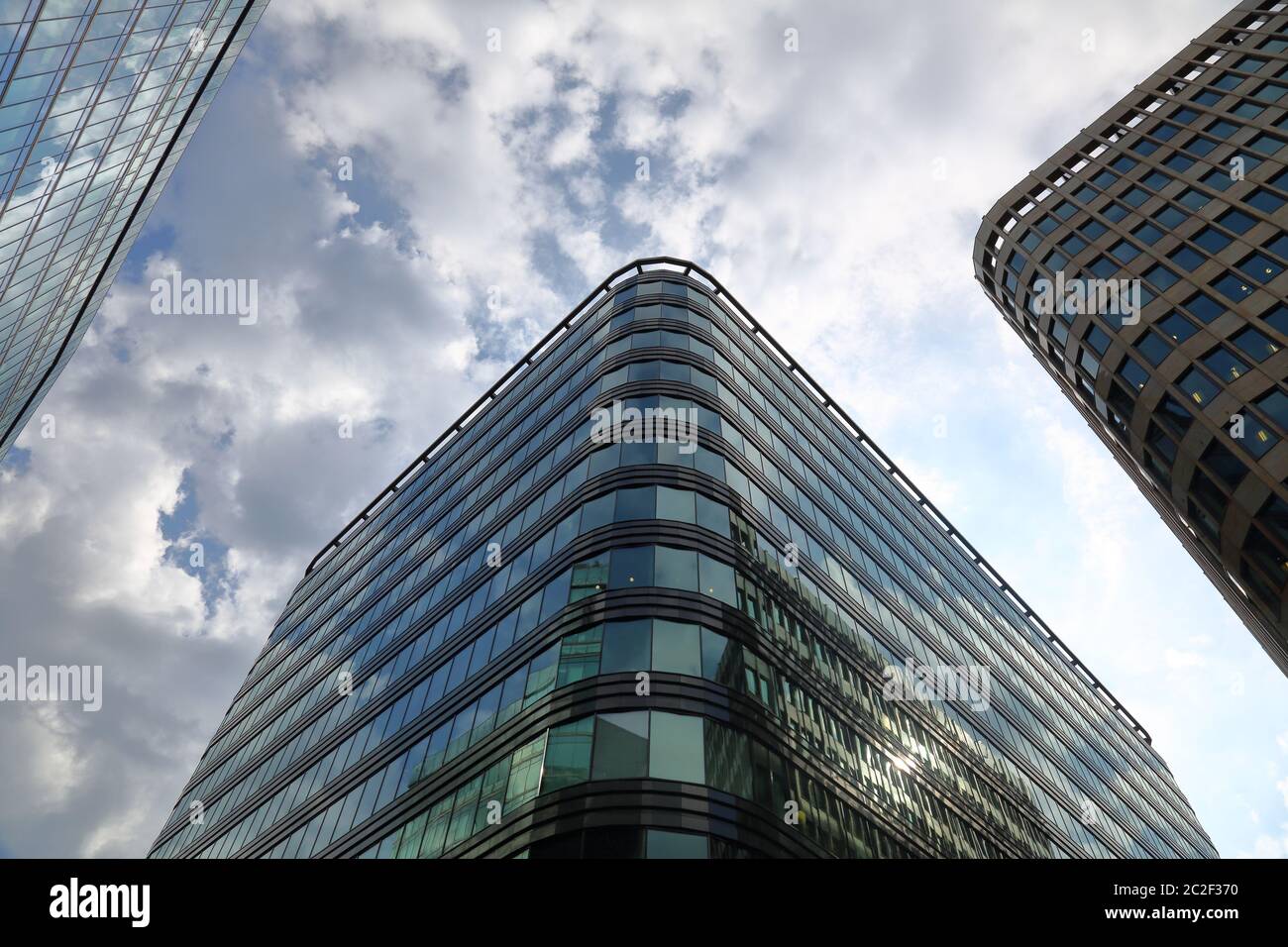 Modern city skyscrapers on sky background Stock Photo - Alamy