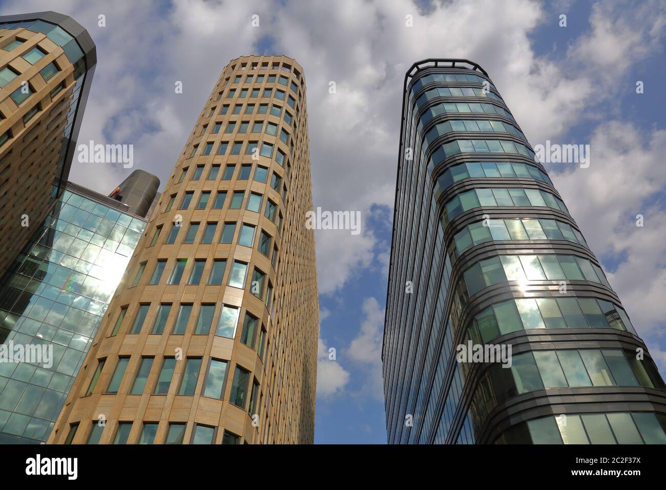 Modern city skyscrapers on sky background Stock Photo - Alamy