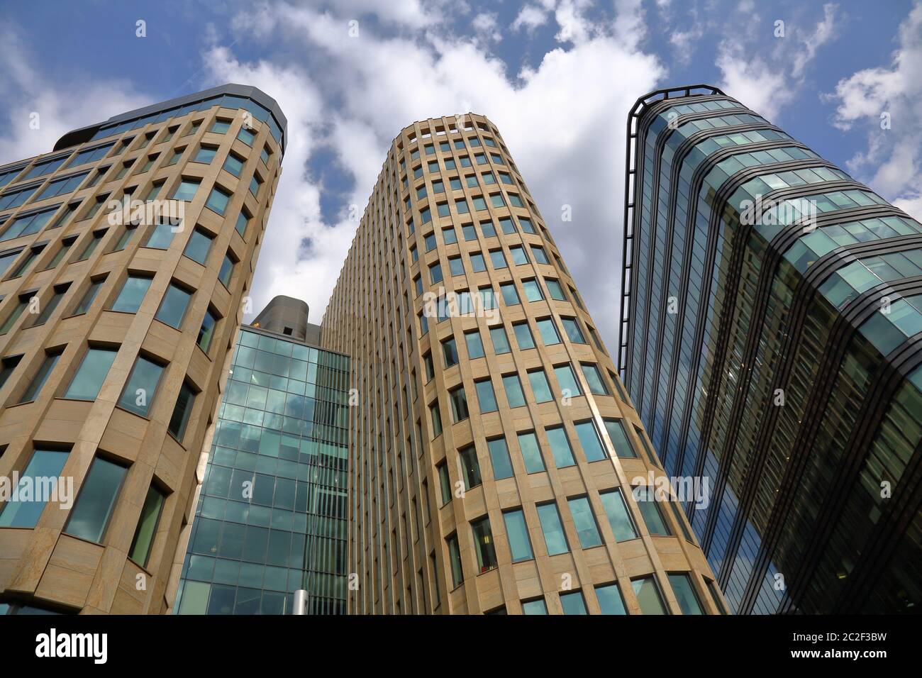 Modern city skyscrapers on sky background Stock Photo - Alamy