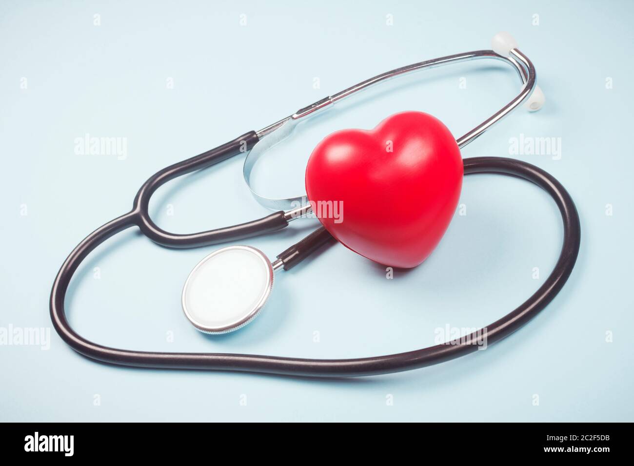 Red heart and stethoscope are symbol of cardiology, health of ...