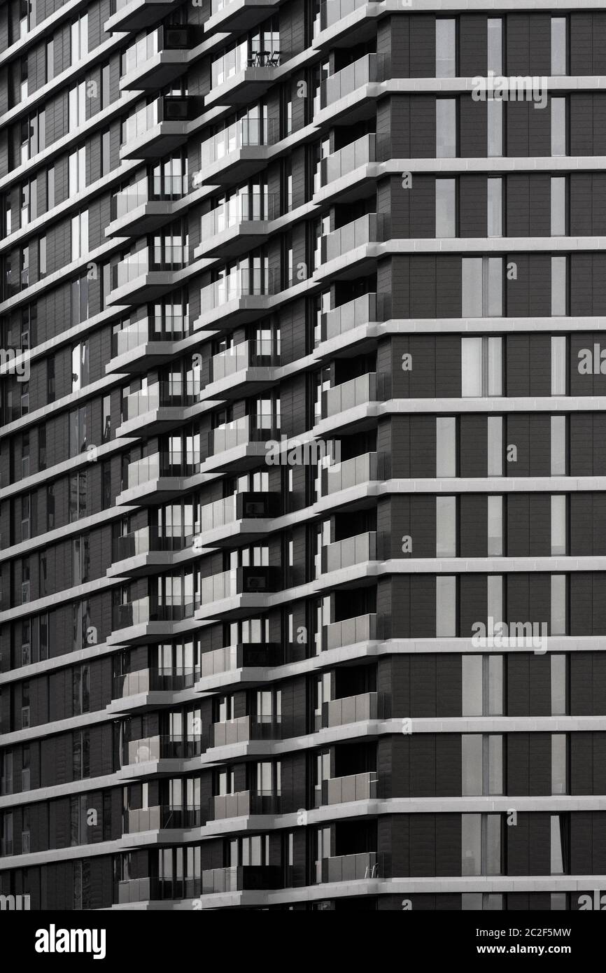 Building exterior of skyscraper, facade with balconies and windows ...