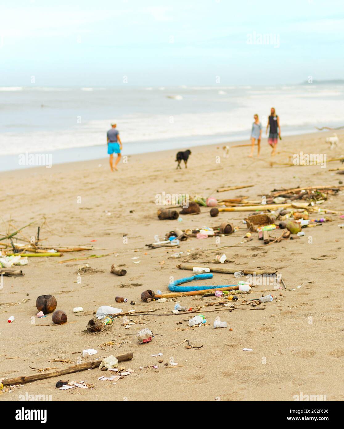 polluted plastic waste beach people Stock Photo - Alamy