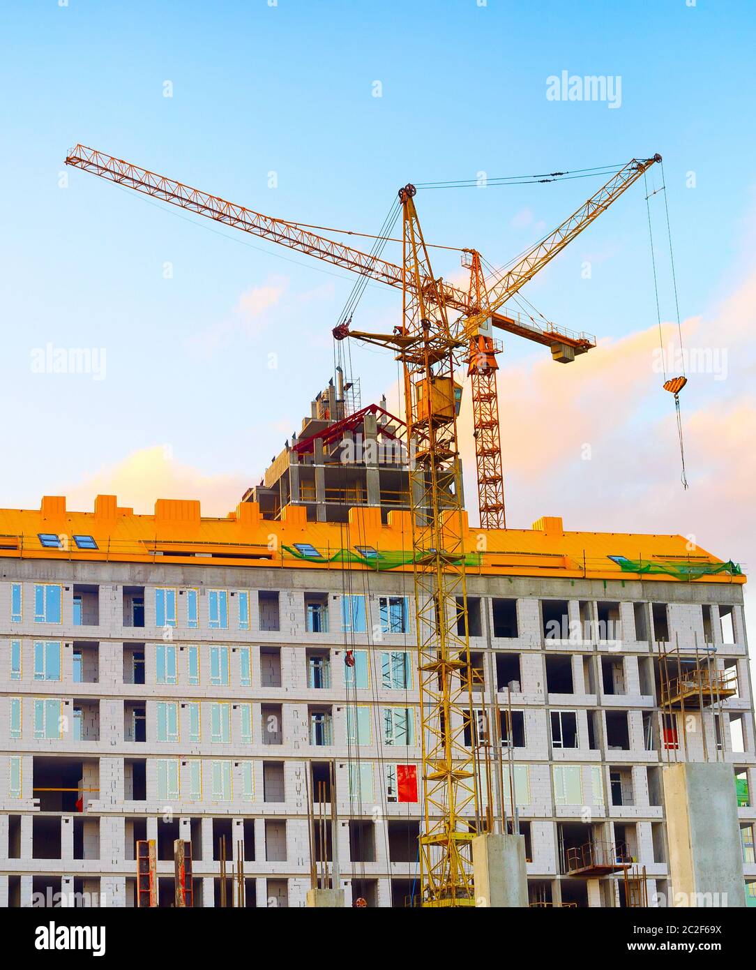 Cranes, construction site, apartments, architecture Stock Photo - Alamy