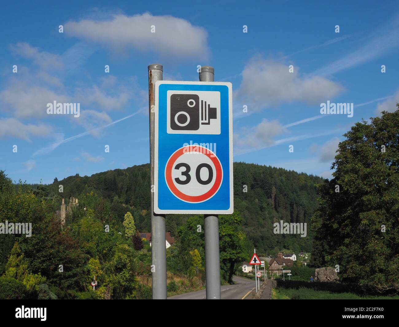 Speed camera sign, with 30 kmph or 30 mph Stock Photo - Alamy