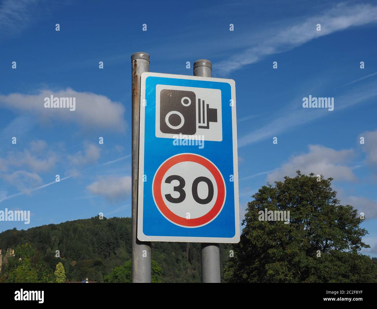 Speed camera sign, with 30 kmph or 30 mph Stock Photo - Alamy