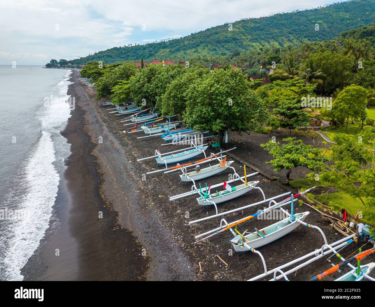 Aerial view of Amed beach in Bali, Indonesia. Traditional fishing boats ...