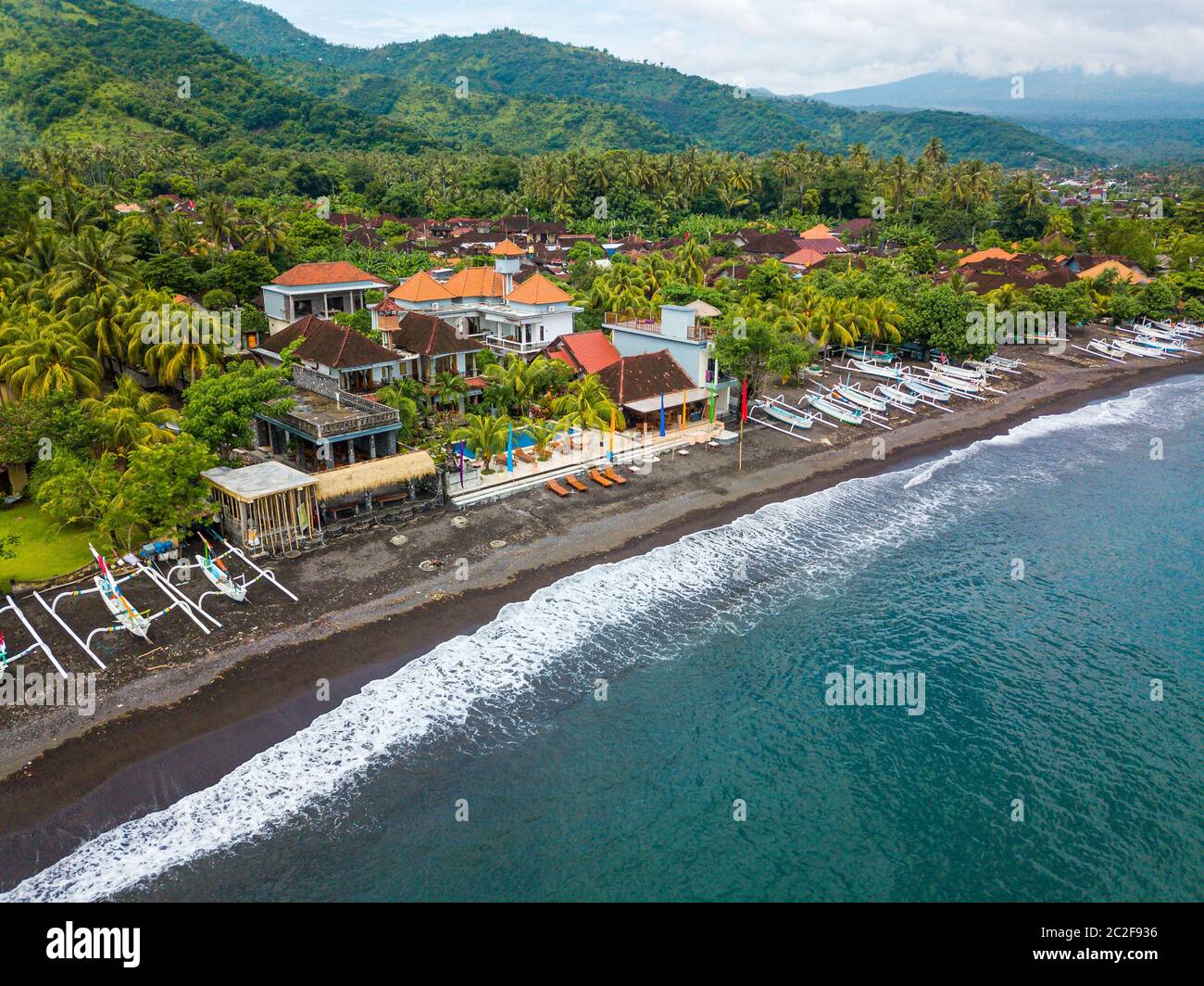 Aerial view of Amed beach in Bali, Indonesia. Traditional fishing boats ...