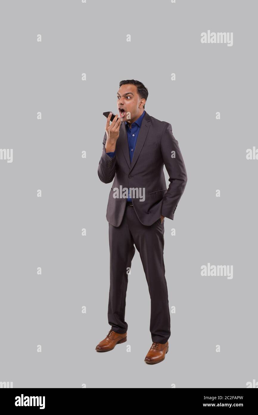 Businessman Angry Talking on Phone Isolated. Indian Businessman Yelling ...