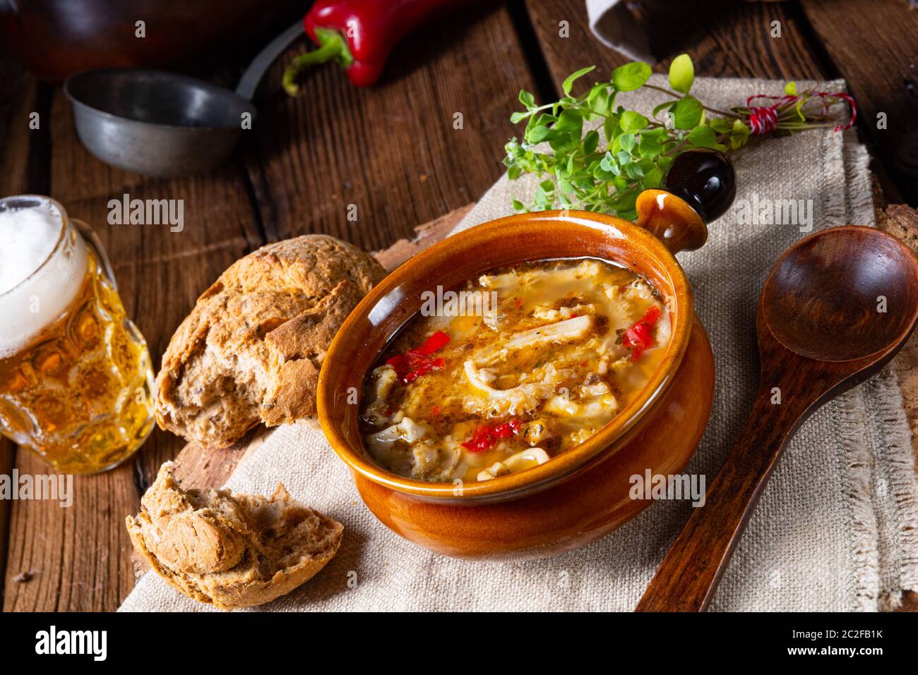 Spicy tripe soup with red paprika Stock Photo - Alamy