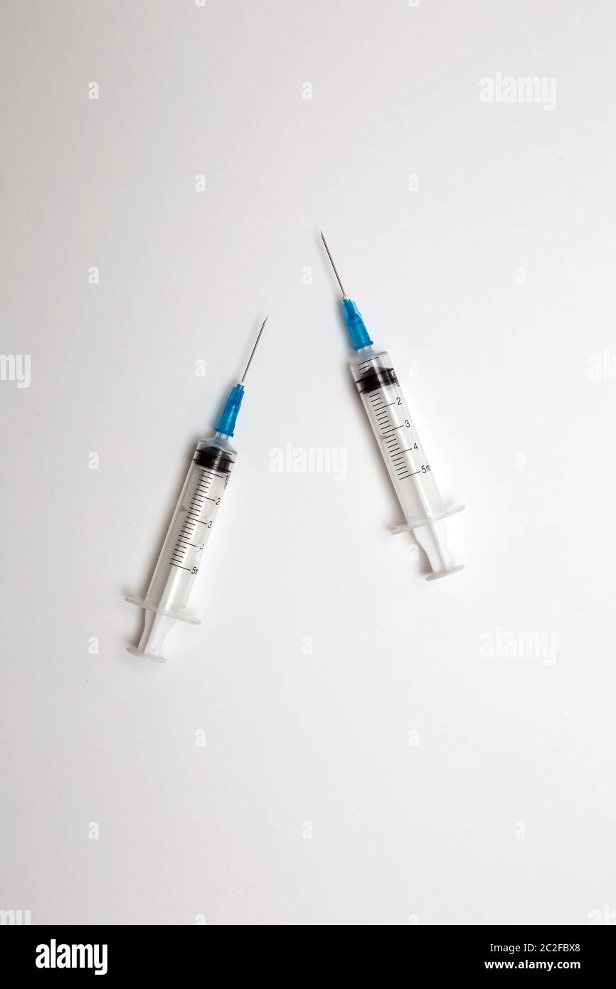Medical syringe isolated over white background, injection needles for ...