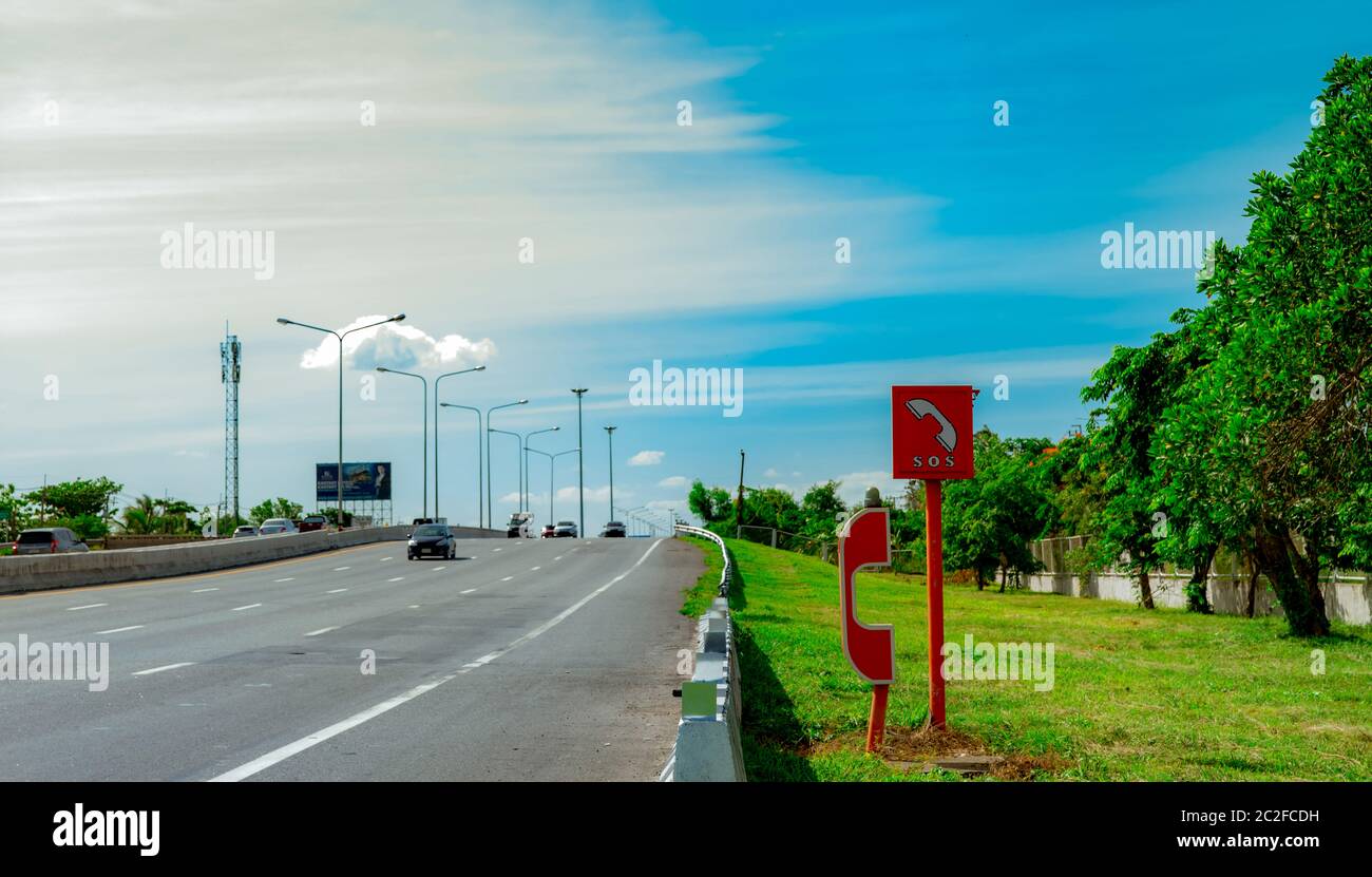 Emergency SOS telephone installed at roadside. Highway SOS call box ...