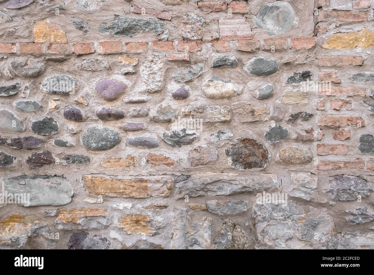 Ancient colored wall made stone hi-res stock photography and images - Alamy