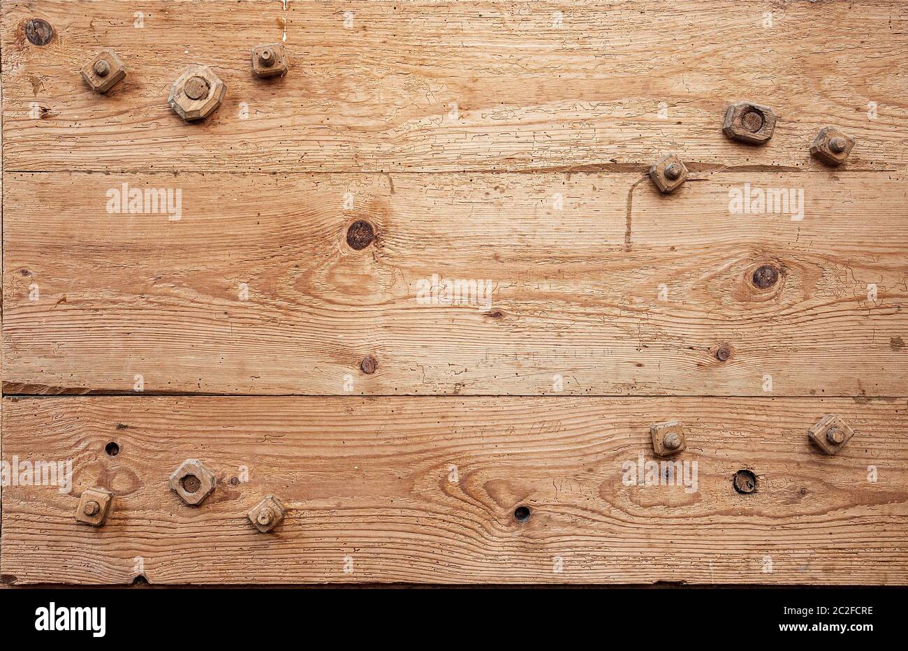 Background old wood with metal bolts. Texture of old wood with fixing ...