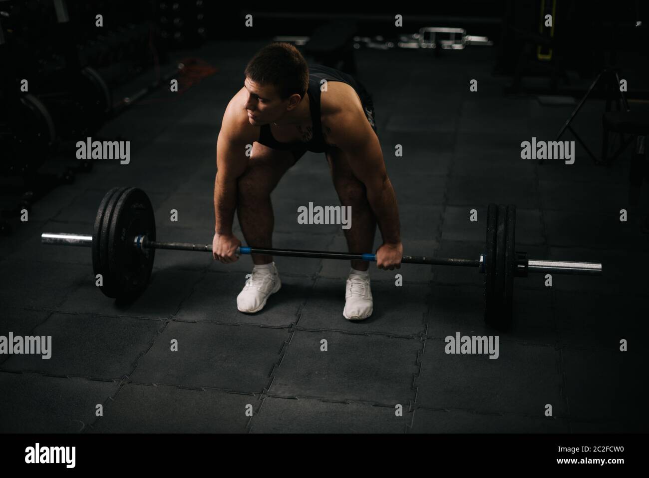 Muscular young man with perfect beautiful body wearing sportswear ...