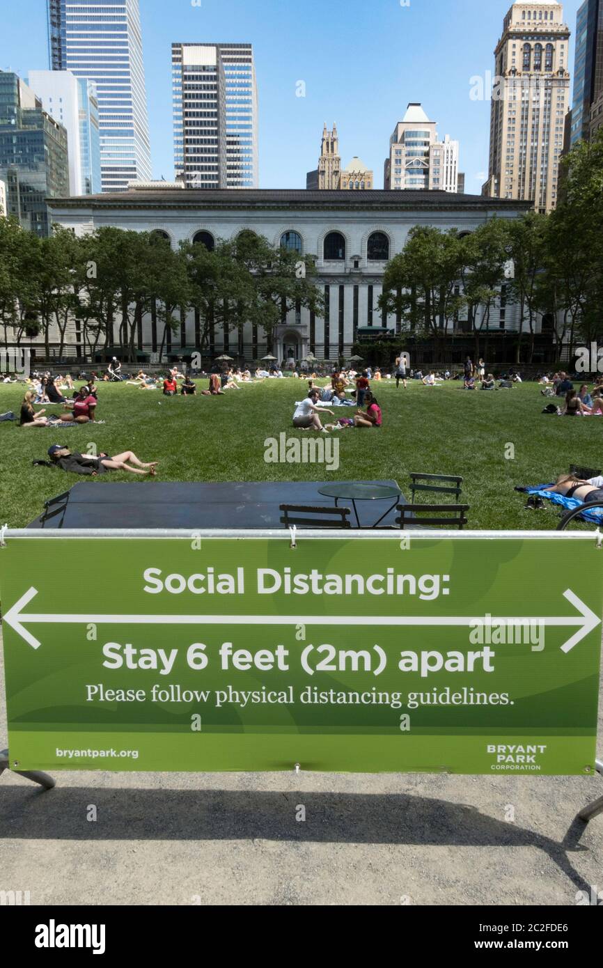 Social Distancing signs are a common sight in New York City due to the ...