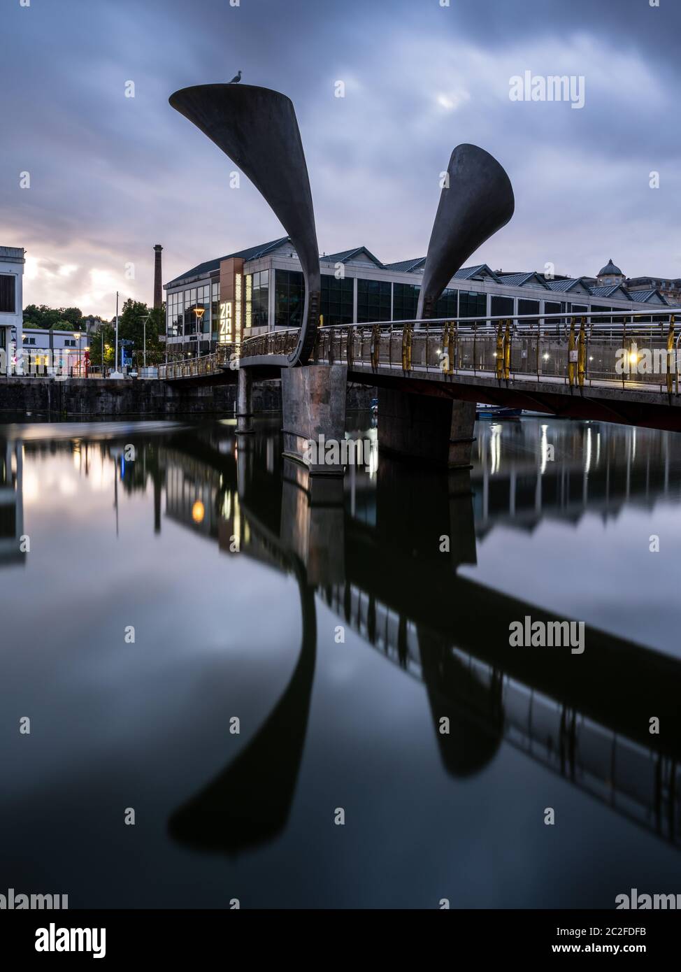 Bristol, England, UK - June 8, 2020: The sun sets over the transit shed ...