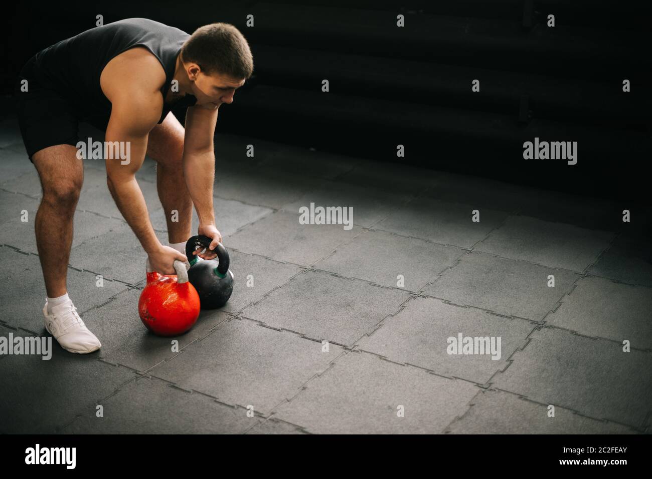 Strong muscular man with perfect beautiful body wearing sportswear ...