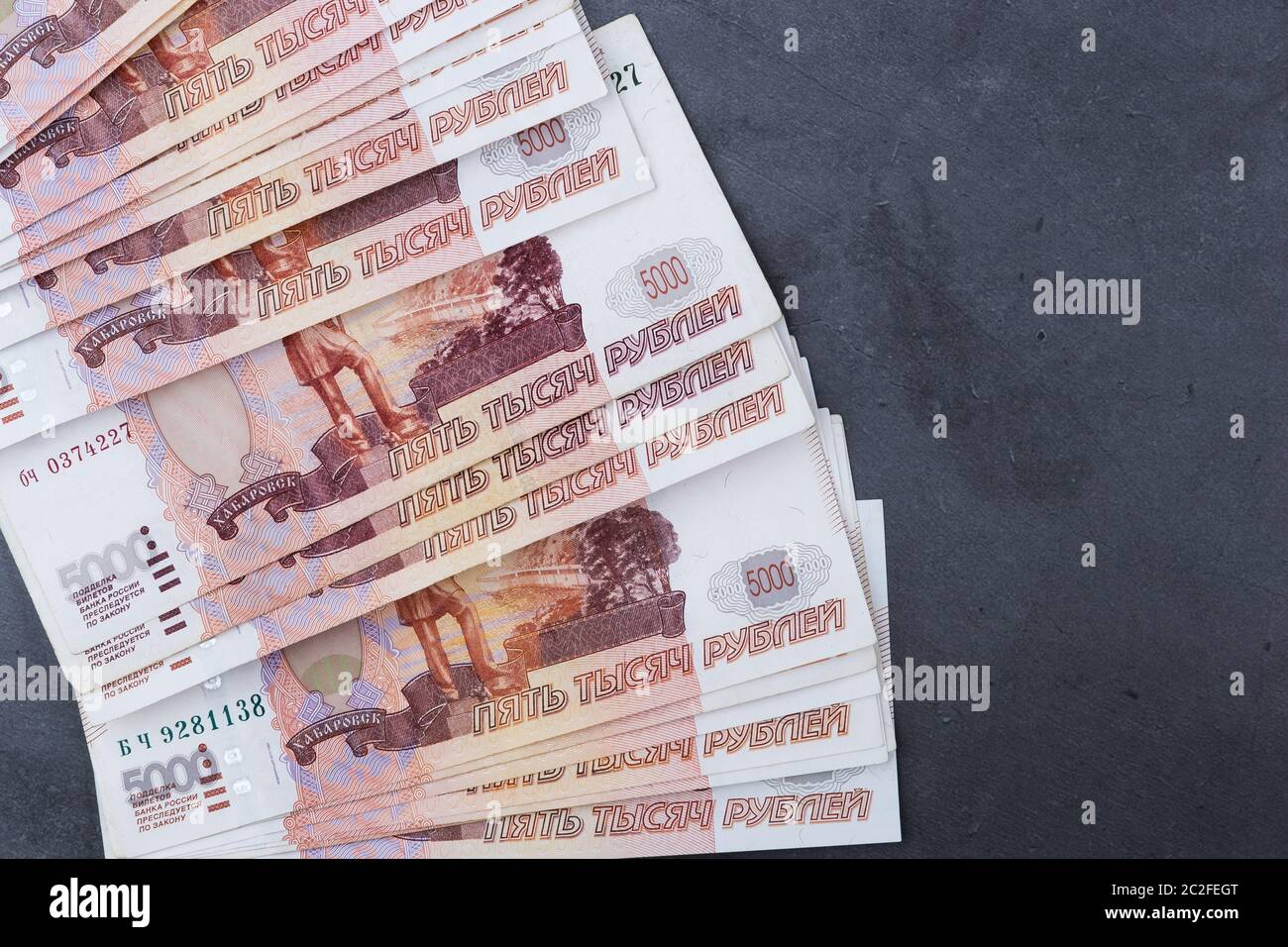 Big stack of Russian money banknotes of five thousand rubles lying on a ...