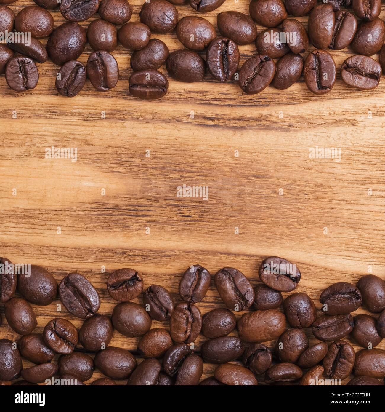 Coffee bean. The background of roasted coffee beans is brown on wooden ...