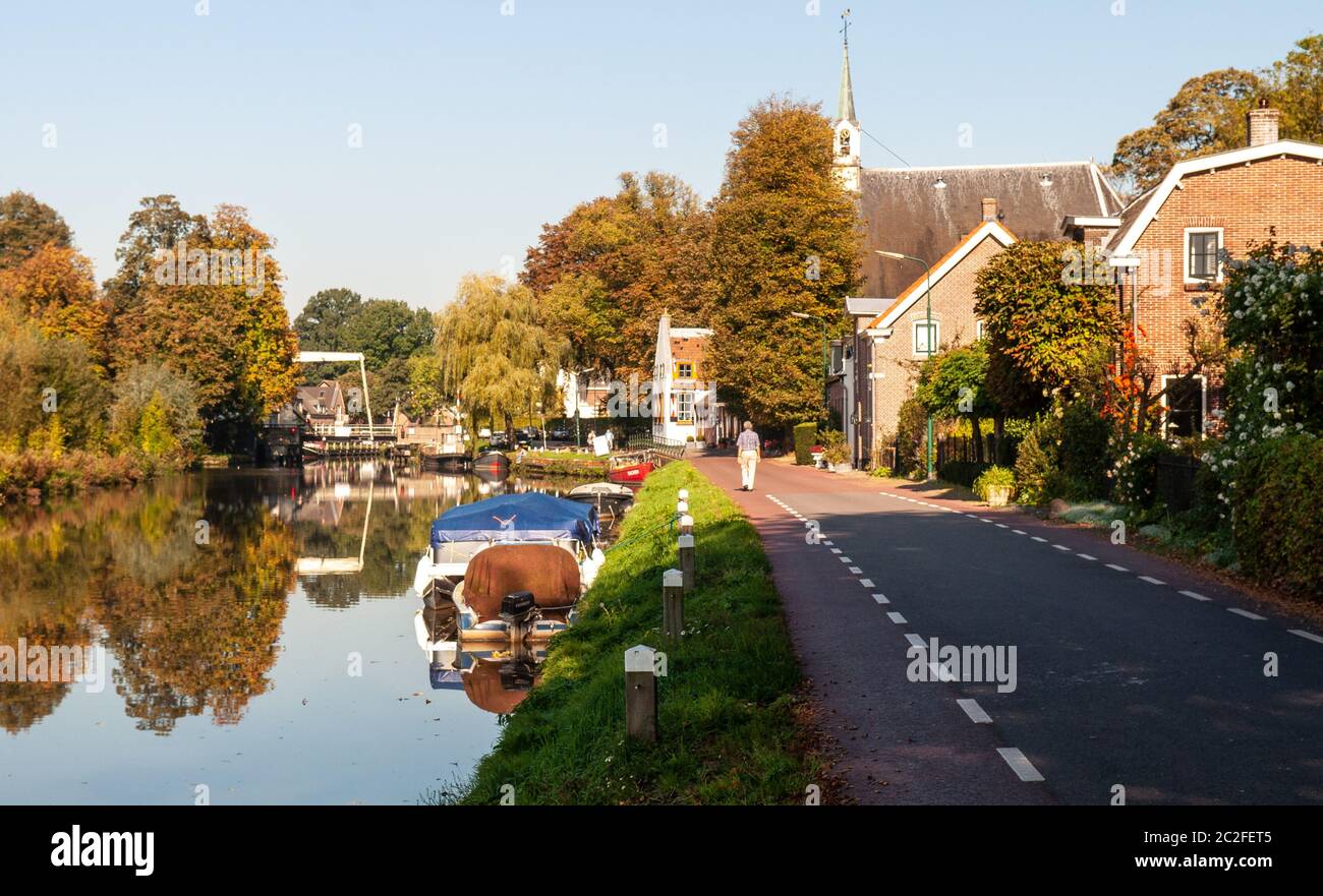 Utrecht, Netherlands - September 30, 2011: A man walks along a street ...