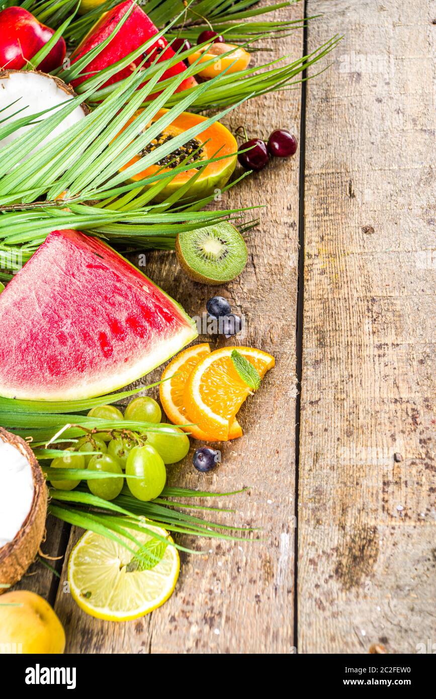 Assorted different summer tropical fresh raw fruits and berries. Clean ...