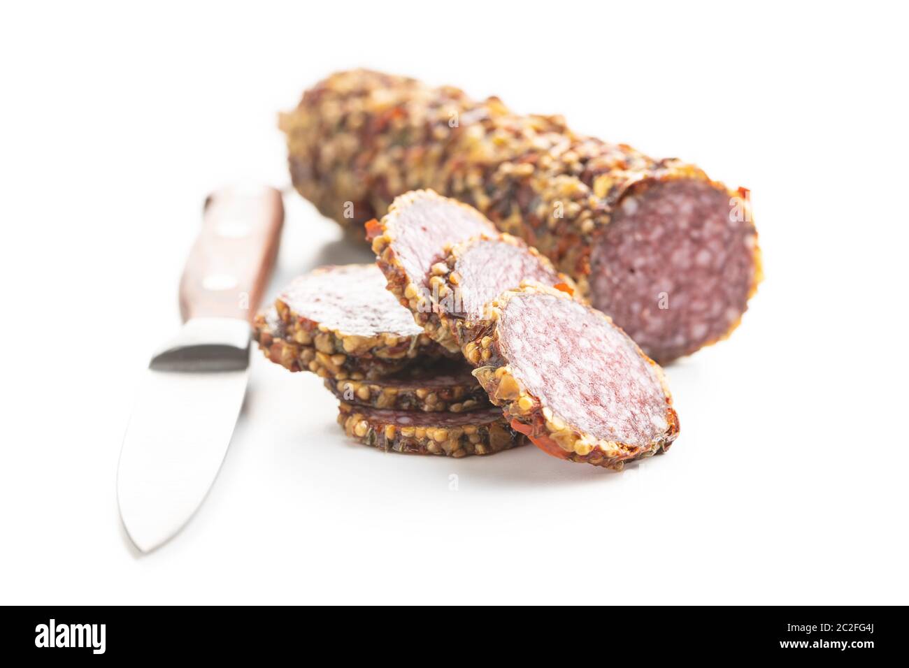 Spicy salami sausage and knife isolated on white background Stock Photo ...