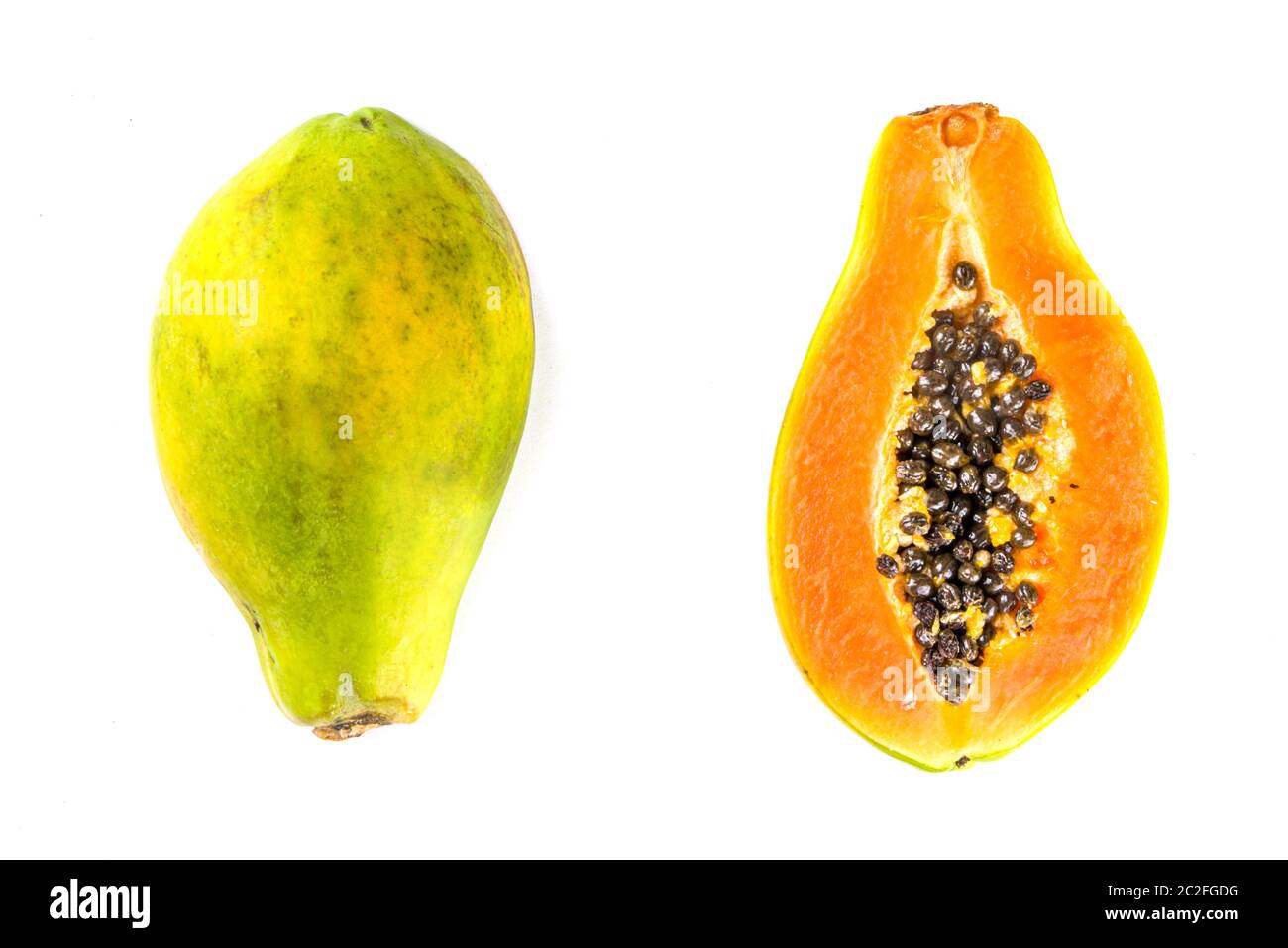 Raw juicy fresh papaya fruit isolate on a white background. Half and ...
