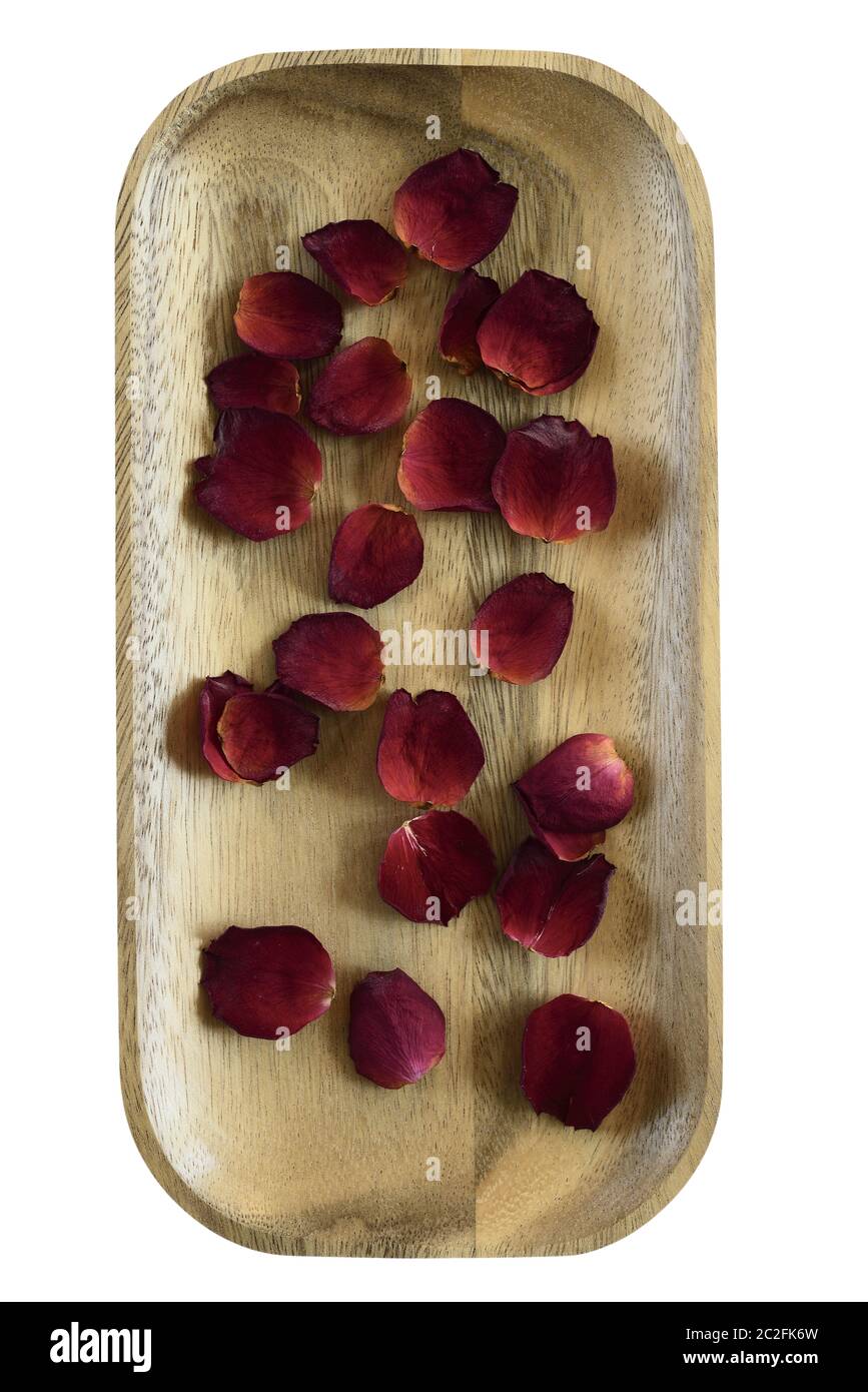 red rose petals on wooden tray Stock Photo - Alamy