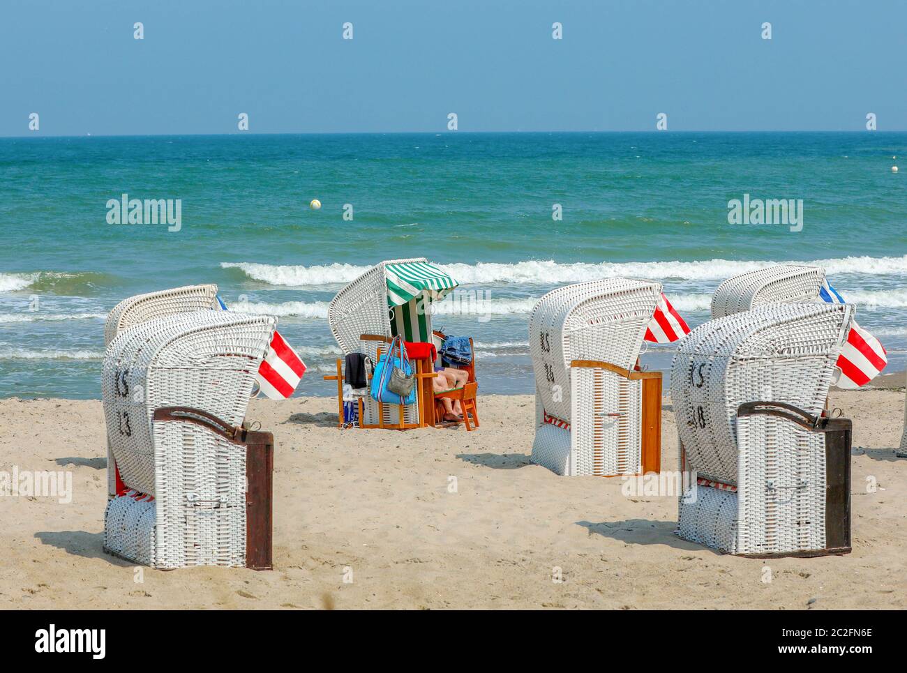 beach boxes with vacationers on the beach on a sunny day Stock Photo ...
