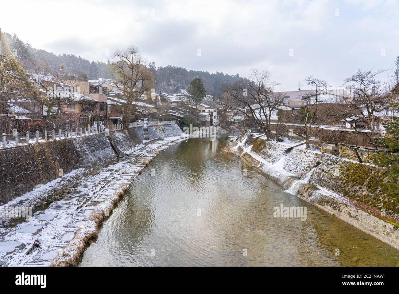 Takayama old town with snow falling in Gifu, Japan Stock Photo - Alamy
