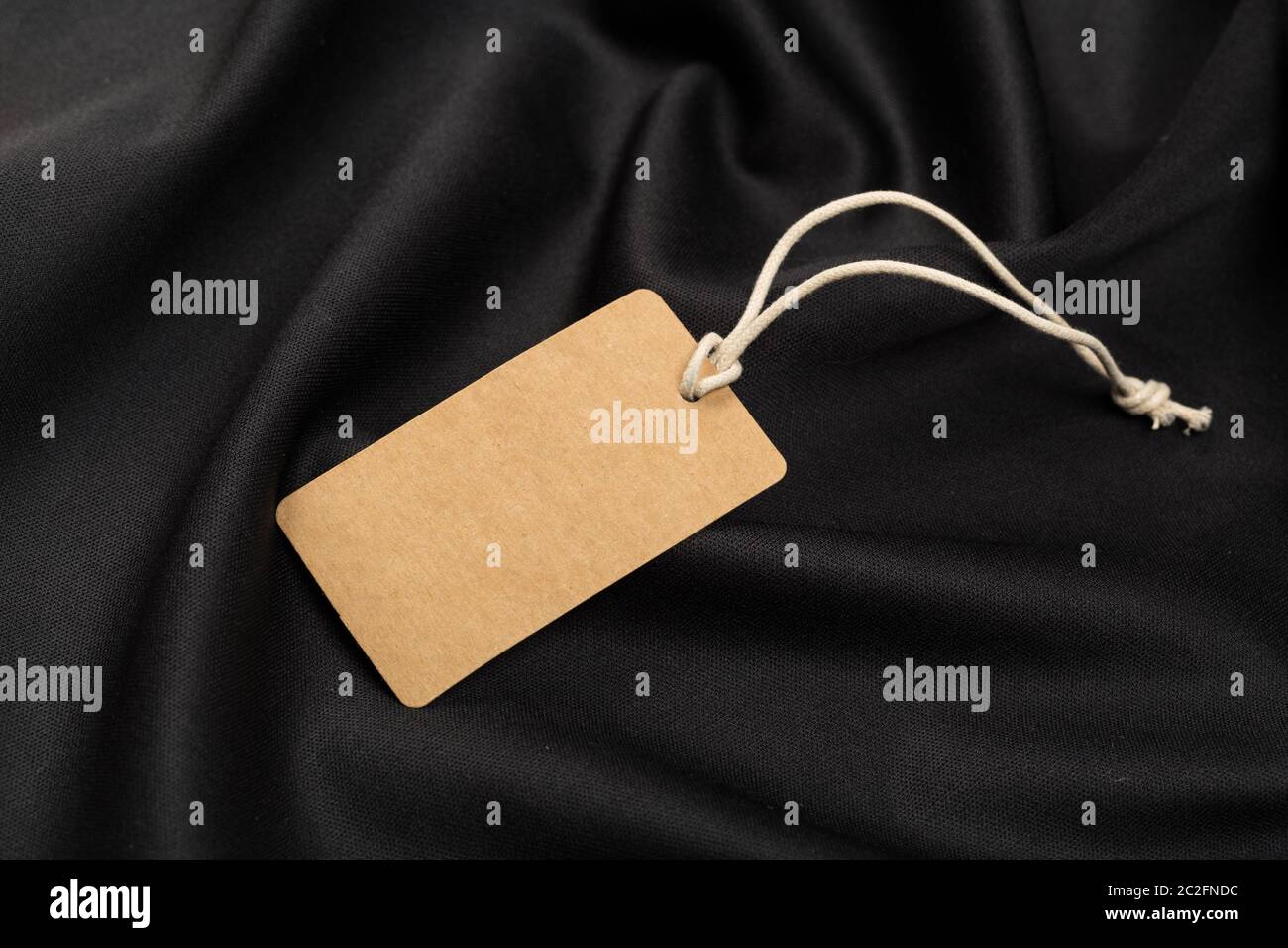 Rectangular Tag on a clothes. fashion, people and shopping concept ...
