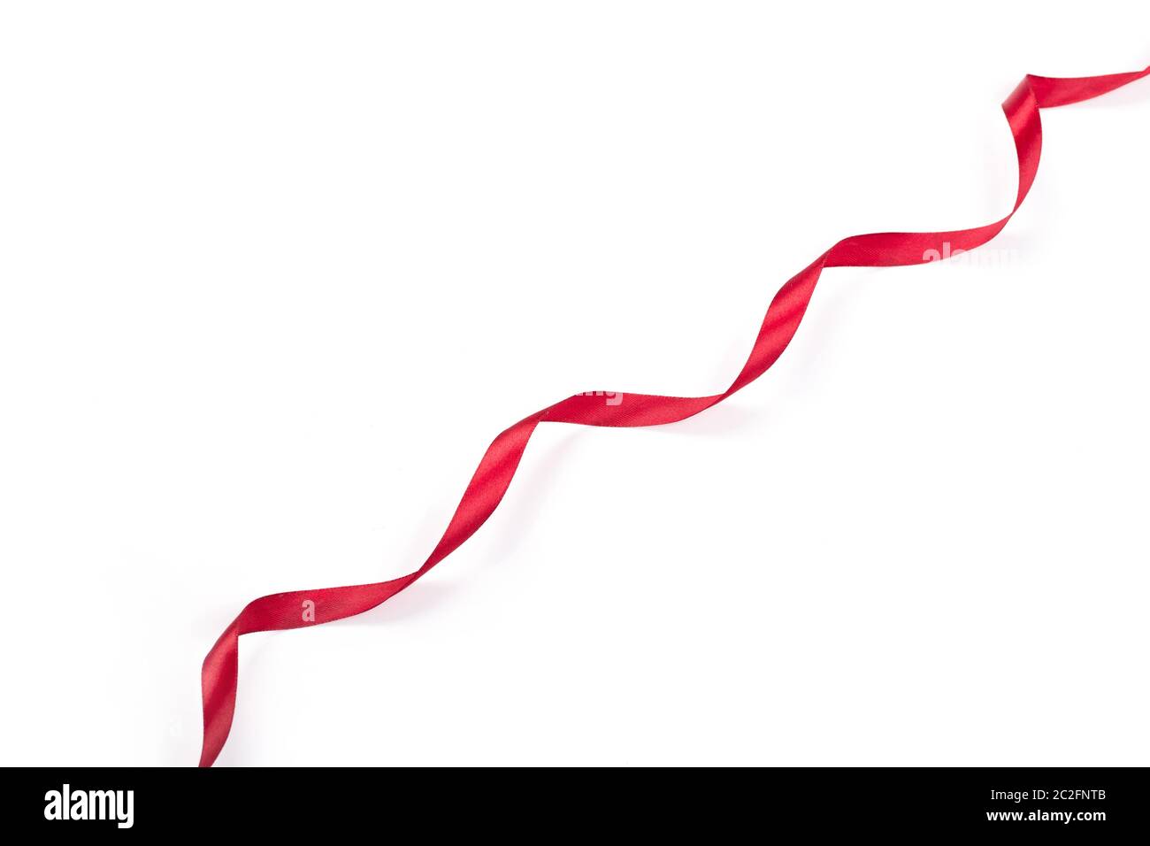 Red ribbon isolated on white background Stock Photo - Alamy