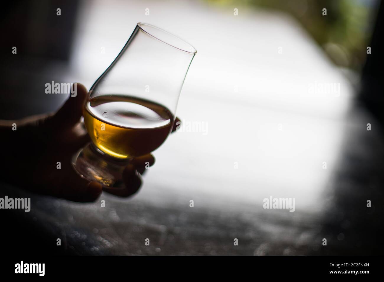 Hand grabbing a glass hi-res stock photography and images - Alamy