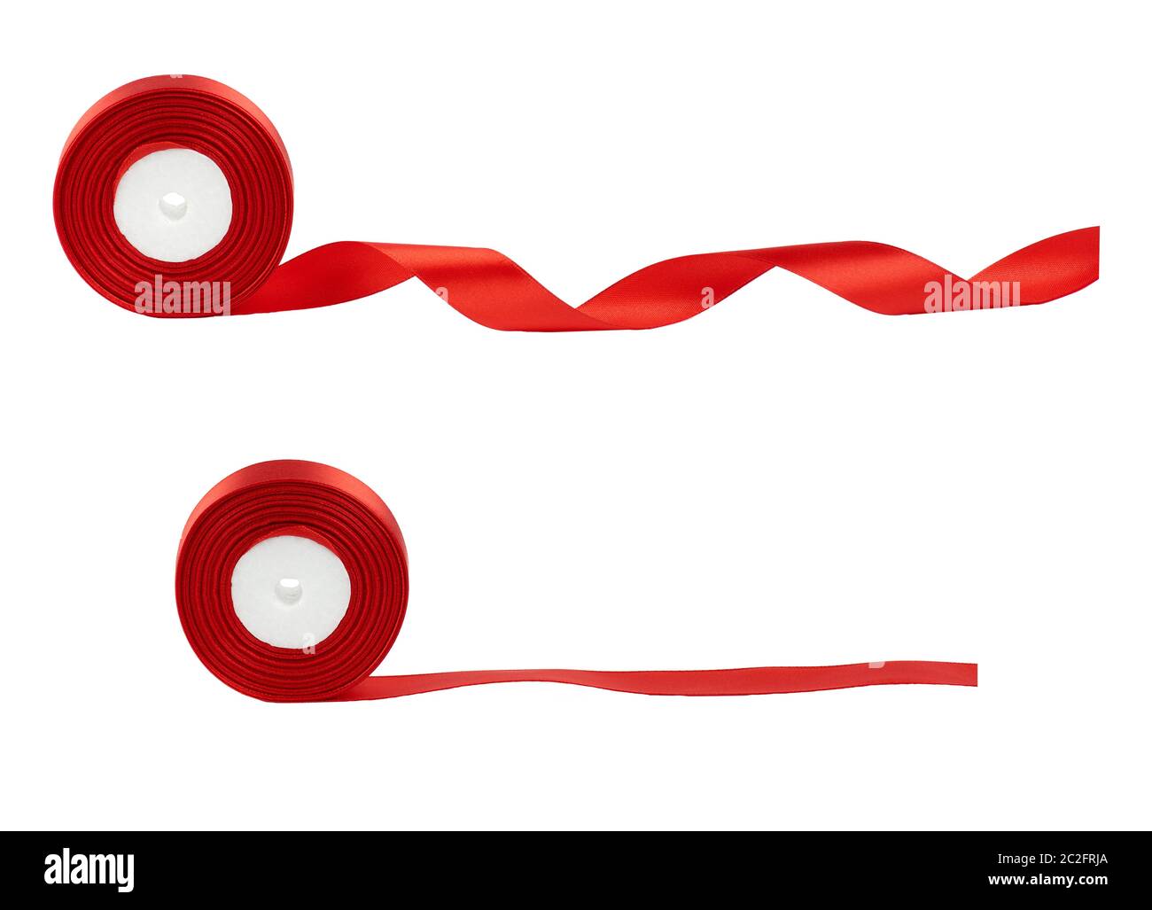 set of untwisted coils of red satin ribbon isolated on a white ...
