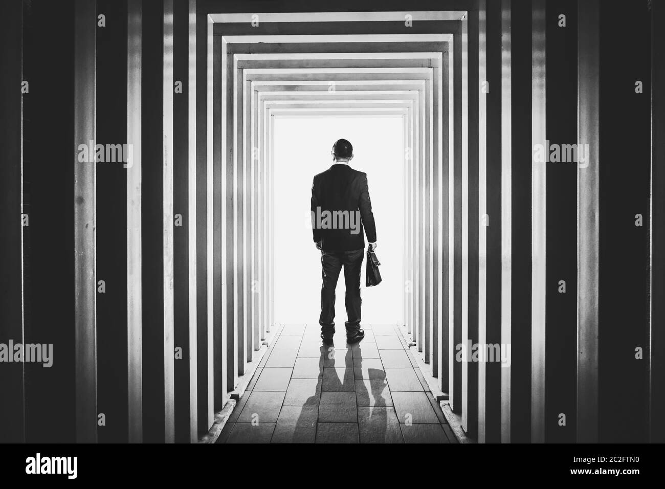 Businessman in line-shaped corridors and confused to exit the unknown ...