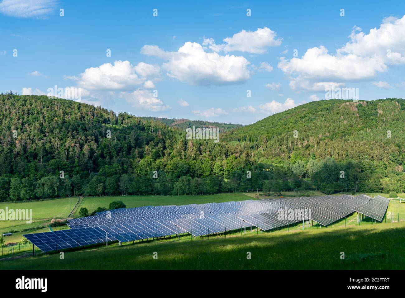Photovoltaic plant, in a valley of the Sauerland in Hesse, west of ...