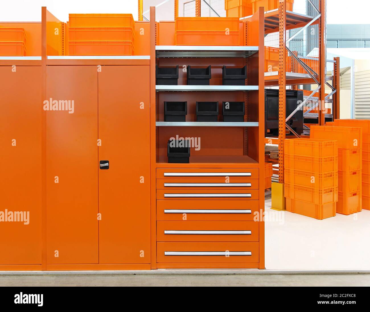 Orange shelving system for storage in warehouse Stock Photo - Alamy