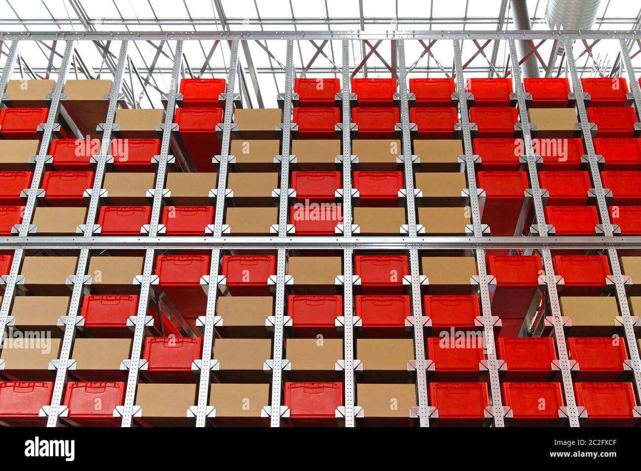 Warehouse high shelf racking with boxes and crates Stock Photo - Alamy
